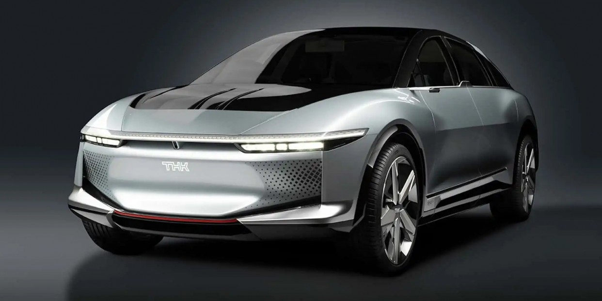 THK unveils futuristic EV with in-wheel motors and wireless charging ...